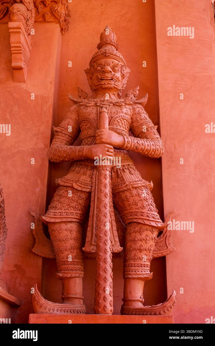Colorful guard Yaksha statue in a Buddhist temple Wat in Thailand ...