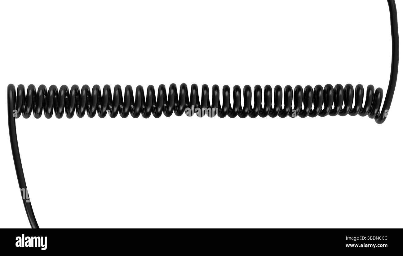 Black insulated cable, coiled. Used in electronics, audio and home ...