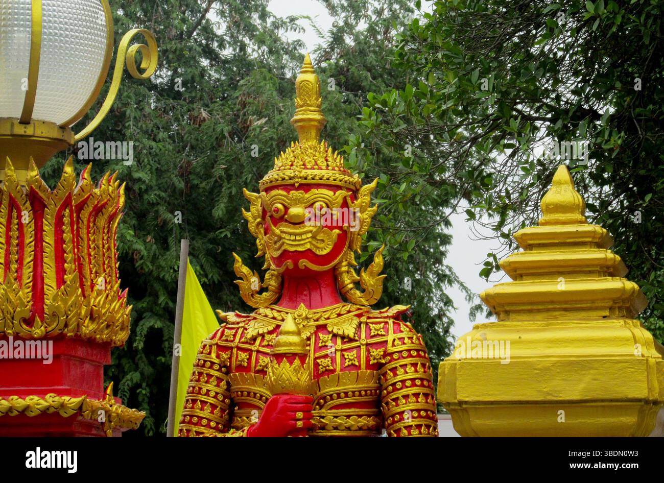 Colorful guard Yaksha statue in a Buddhist temple Wat in Thailand ...