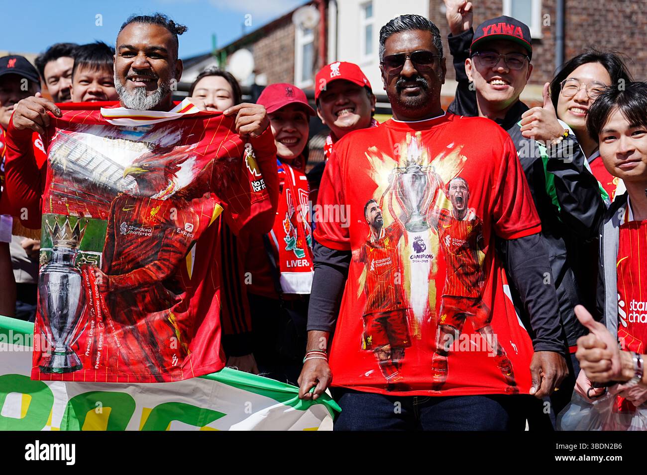 Liverpool fans wearing tribute t-shirts outside the ground before the ...