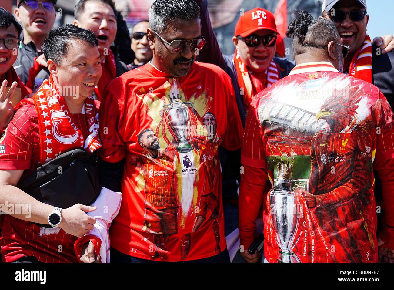 Liverpool fans wearing tribute t-shirts outside the ground before the ...