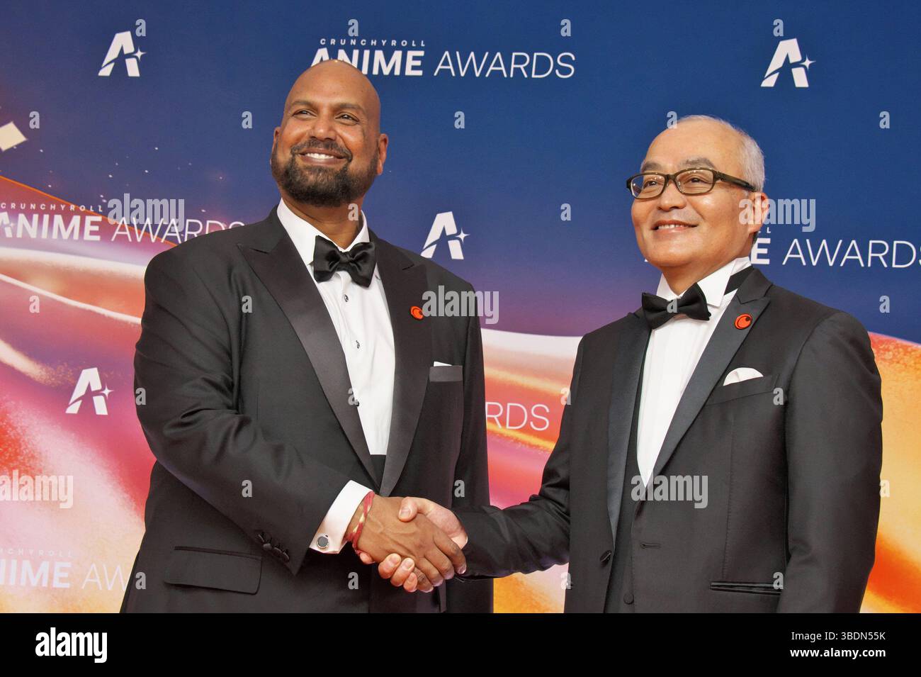 Tokyo, Japan. 25th May, 2025. Crunchyroll CEO Rahul Purini(L) and Sony ...
