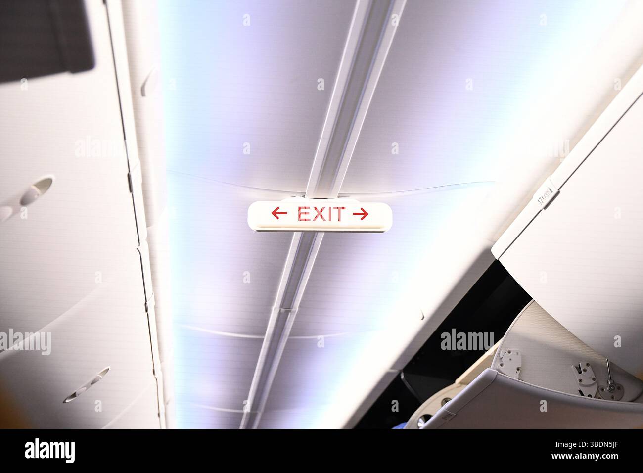 Emergency exit light indicator in the aircraft cabin Stock Photo - Alamy
