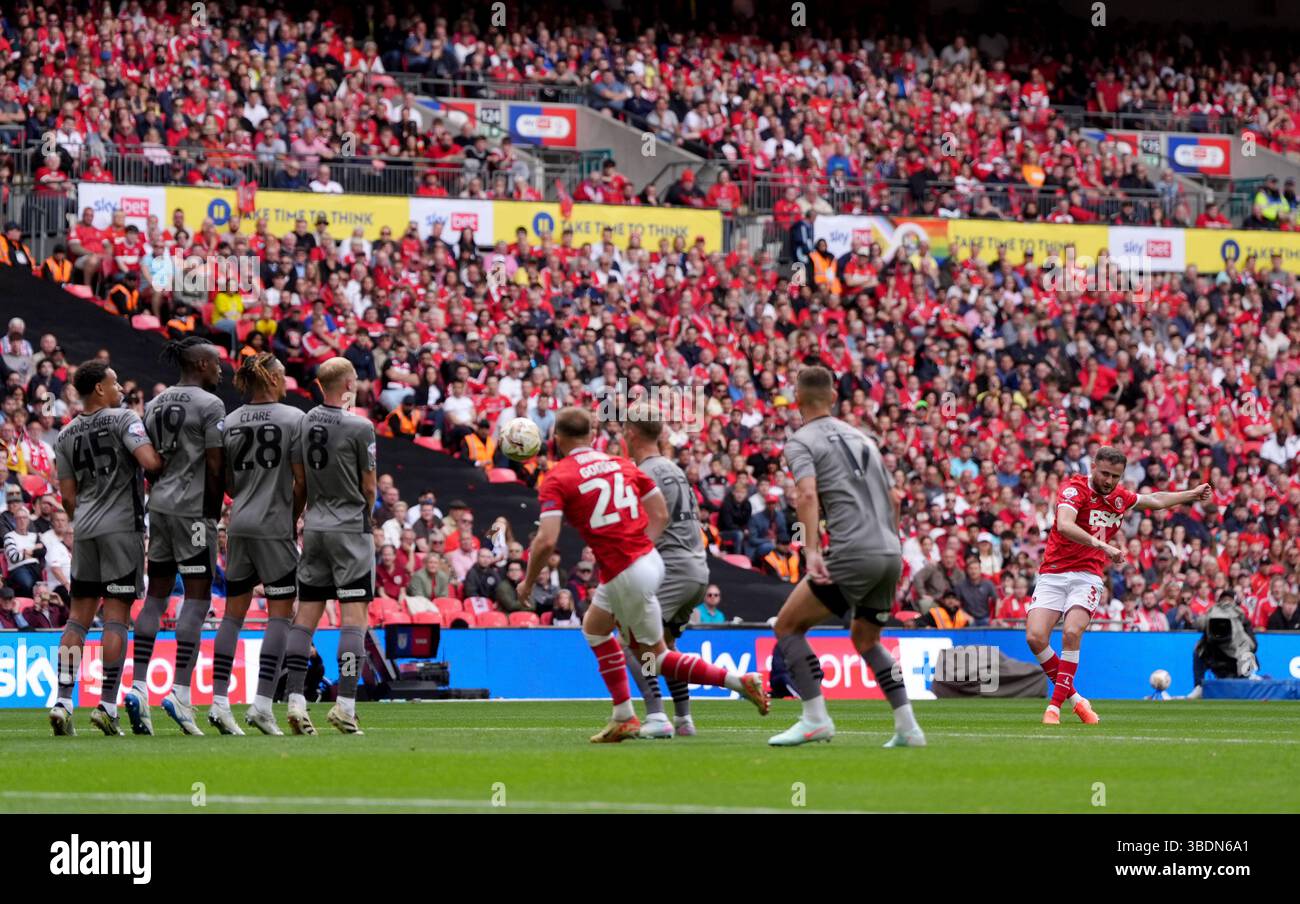 Charlton Athletic's Macaulay Gillesphey (right) score his sides first ...