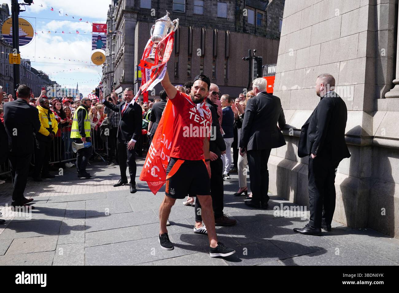 Aberdeen's Graeme Shinnie with the trophy during the Scottish Cup ...