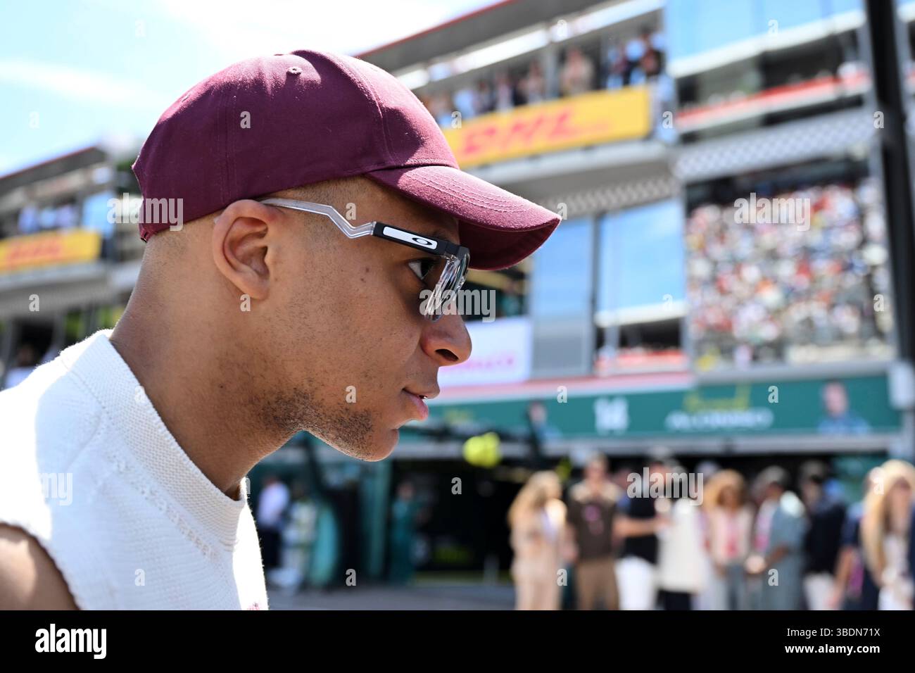 Kylian Mbappe walks through the pits ahead of the Formula One Monaco ...