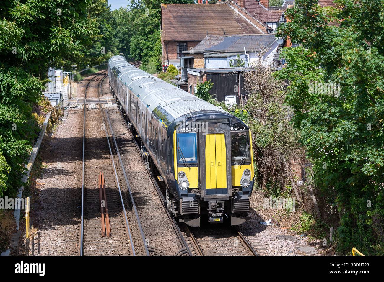 Datchet, Berkshire, UK. 25th May, 2025. A South Western Railway train arriving at Datchet ...