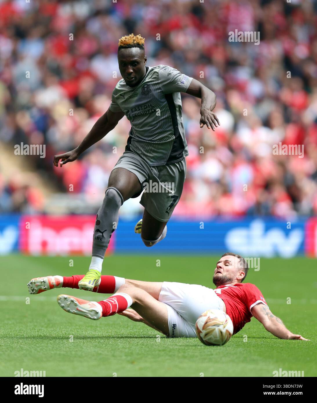 Leyton Orient's Dan Agyei and Charlton Athletic's Macaulay Gillesphey ...