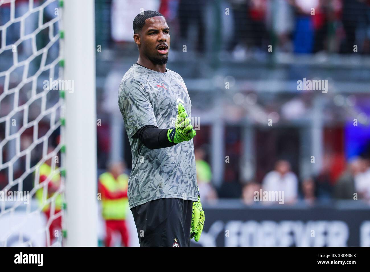 Mike Maignan of AC Milan looks on during Serie A 2024/25 football match ...