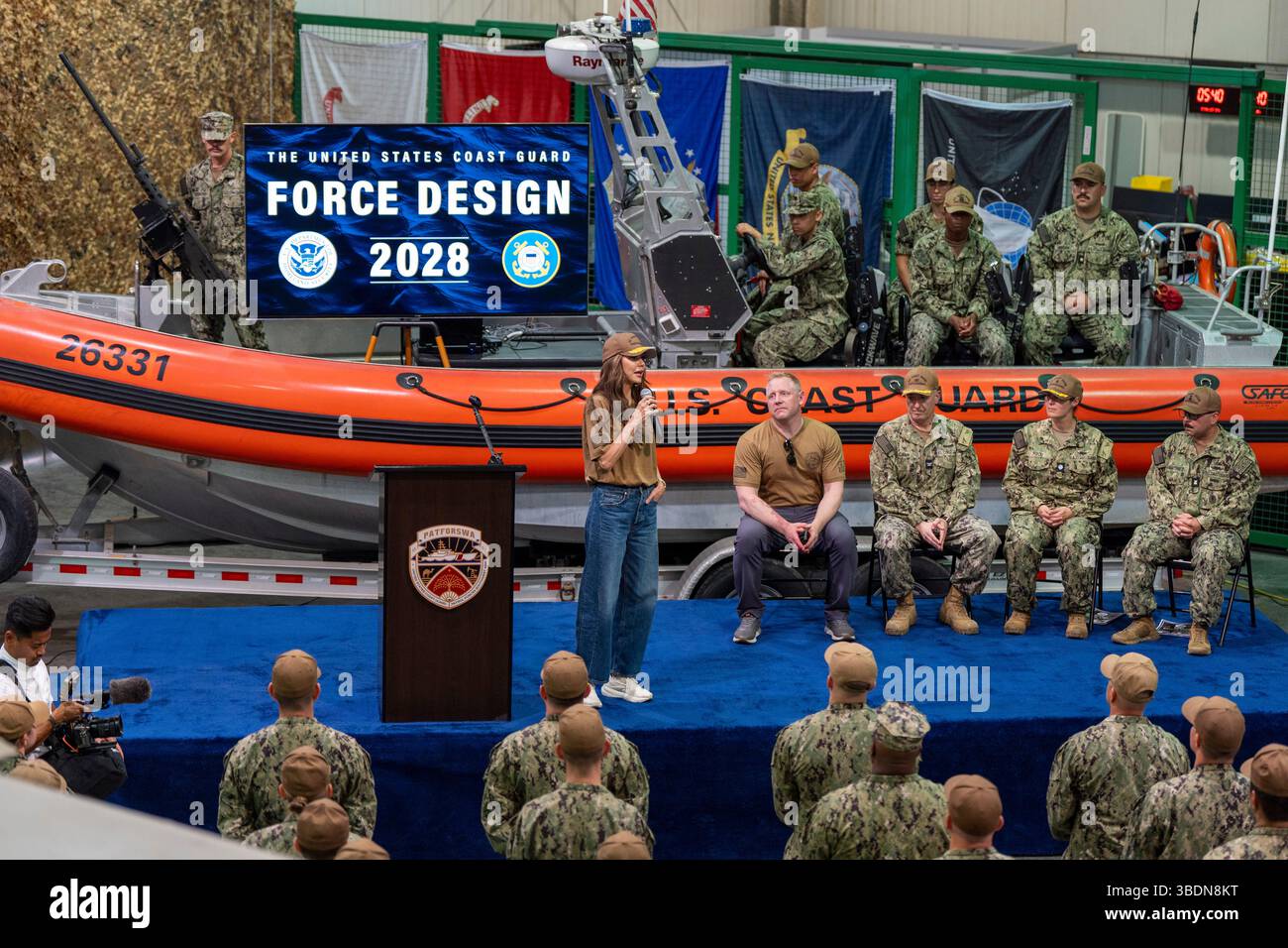 Homeland Security Secretary Kristi Noem speaks to coast guardsmen at Naval Support Activity ...