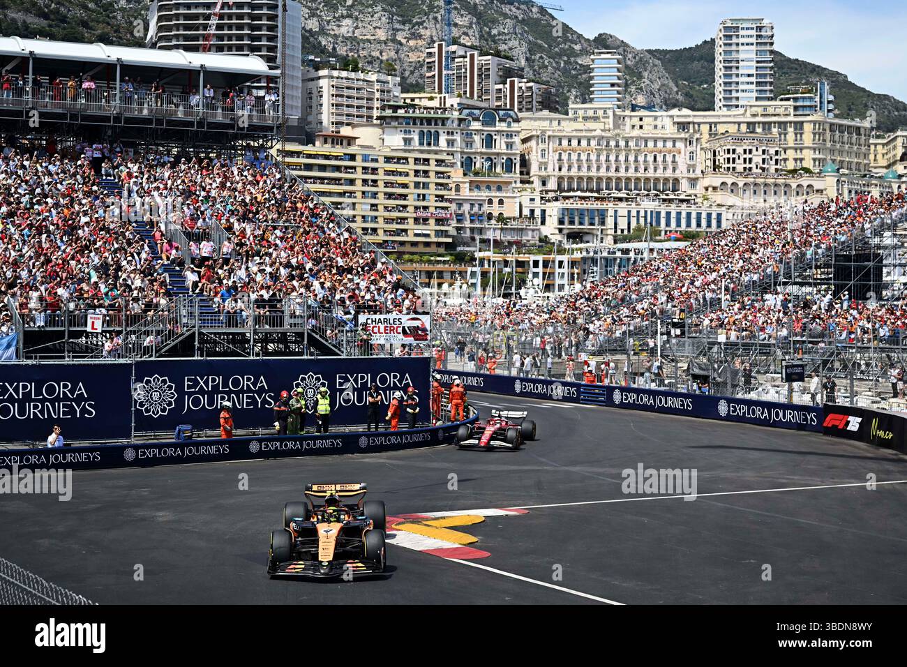 McLaren driver Lando Norris of Britain steers his car in front of ...