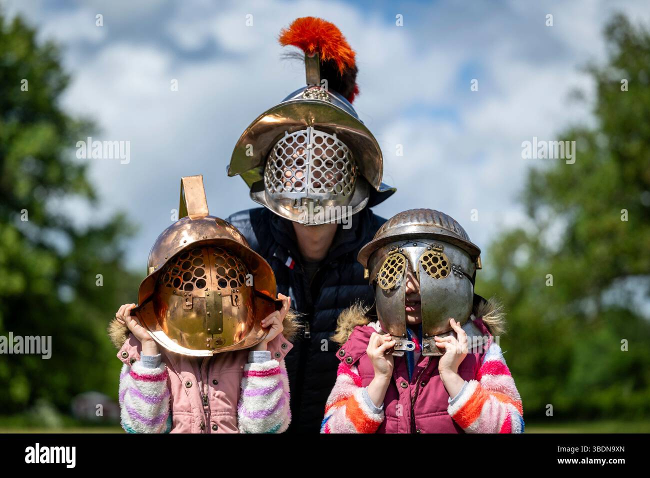 Chalfont, UK. 25 May 2025. Members of the public pose with gladiator ...