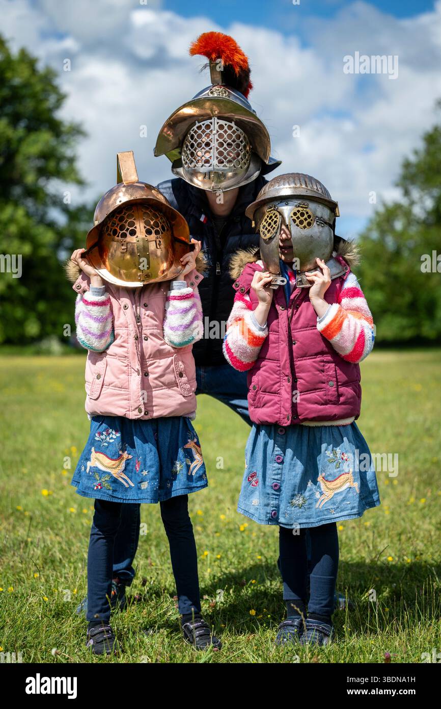 Chalfont, UK. 25 May 2025. Members of the public pose with gladiator ...