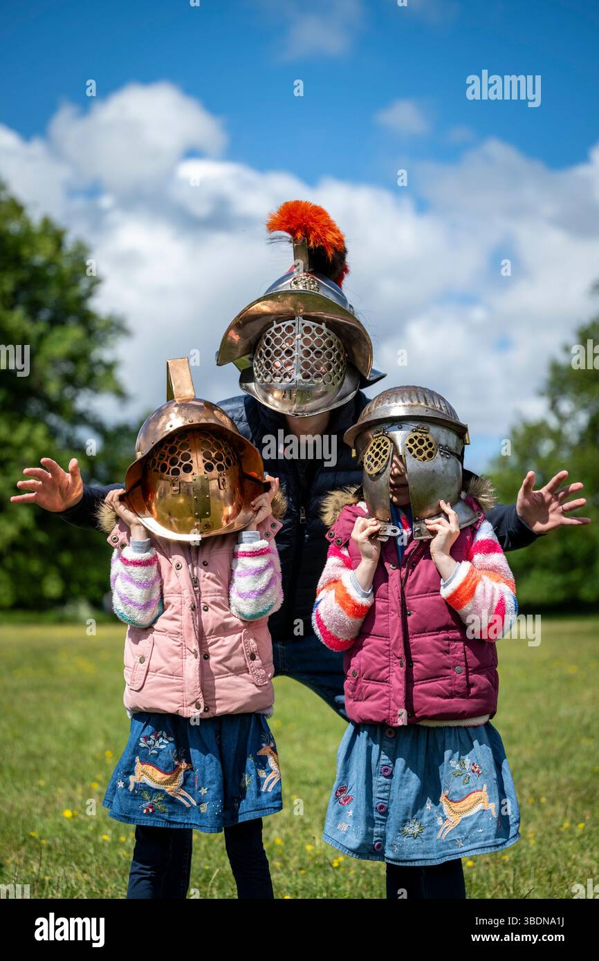Chalfont, UK. 25 May 2025. Members of the public pose with gladiator ...