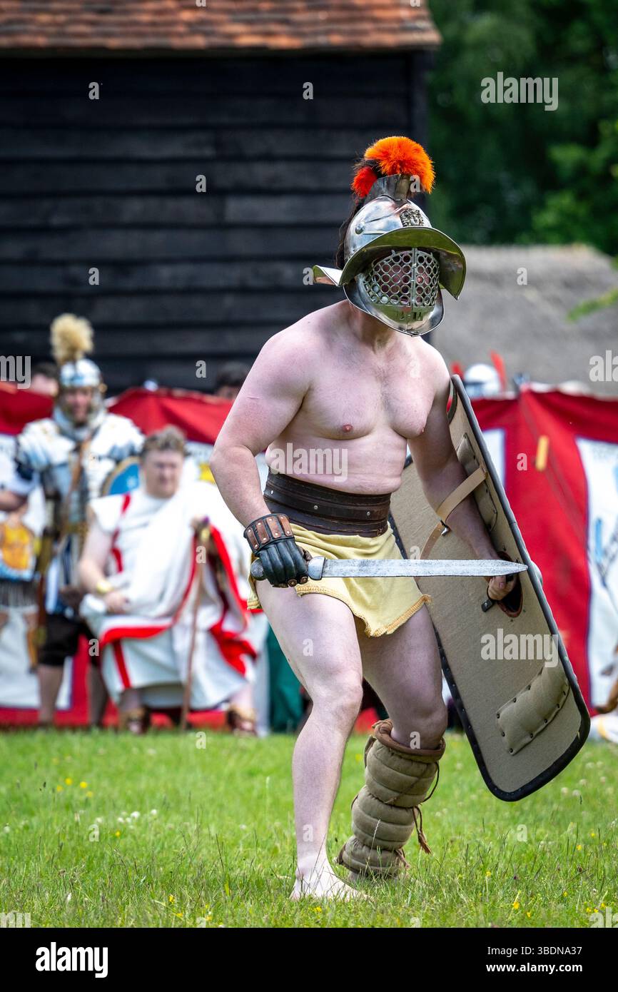 Chalfont, UK. 25 May 2025. A gladiator, watched by the Emperor, takes ...