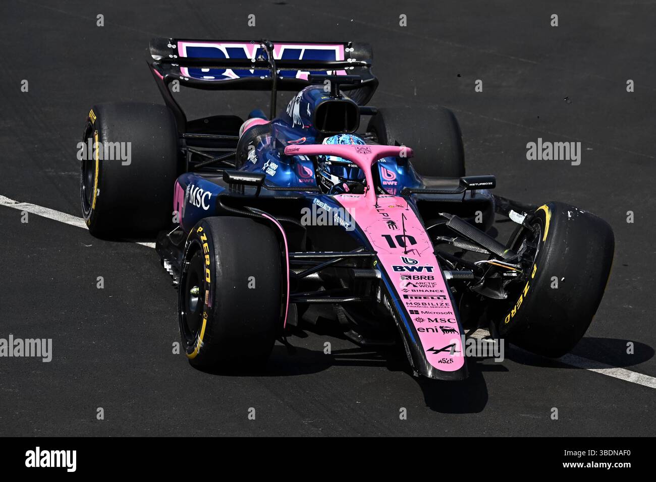 Alpine driver Pierre Gasly of France steers his damaged car during the ...
