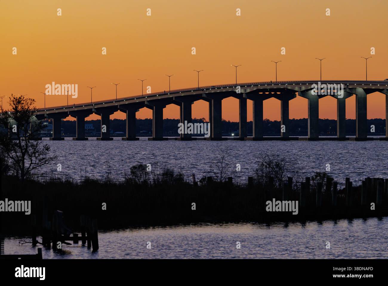 Bay St. Louis Bridge passes behind an inlet at Henderson Point in Pass ...