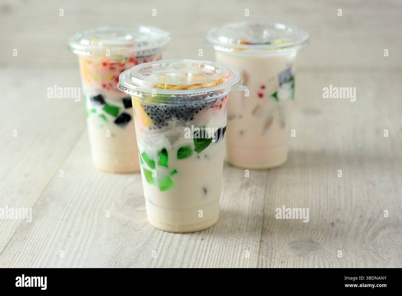 Three Cup of Es Teller Sultan in Plastic Cup, Indonesian Traditional ...
