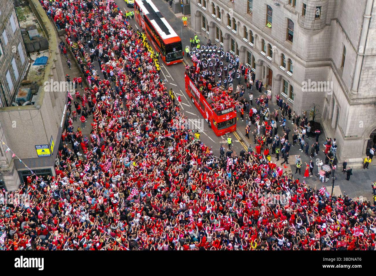 An aerial view as the Aberdeen team bus is greeted by fans outside ...