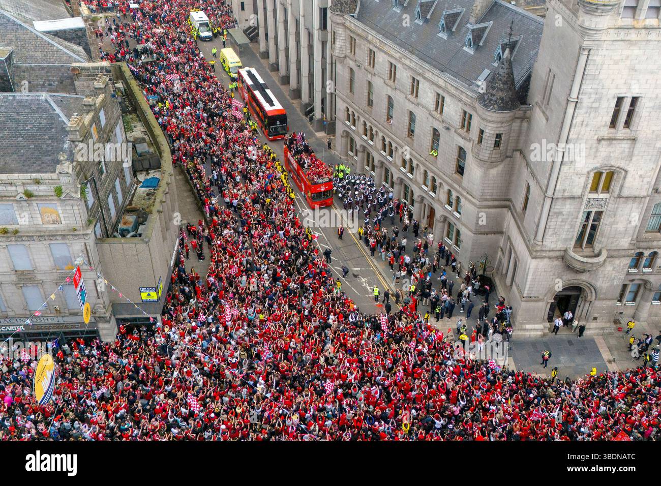 An aerial view as the Aberdeen team bus is greeted by fans outside ...