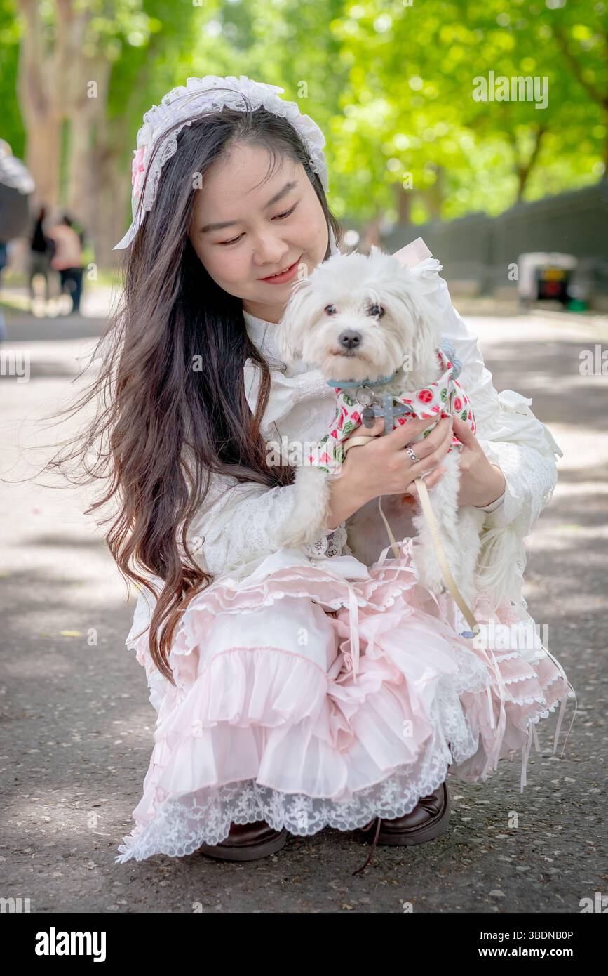 London, UK. 25th May 2025. Pedro the dog with his owner, Iris, at The ...