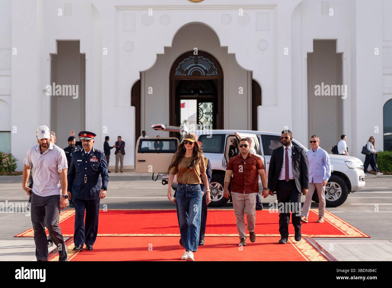 Homeland Security Secretary Kristi Noem walks to her plane to depart ...