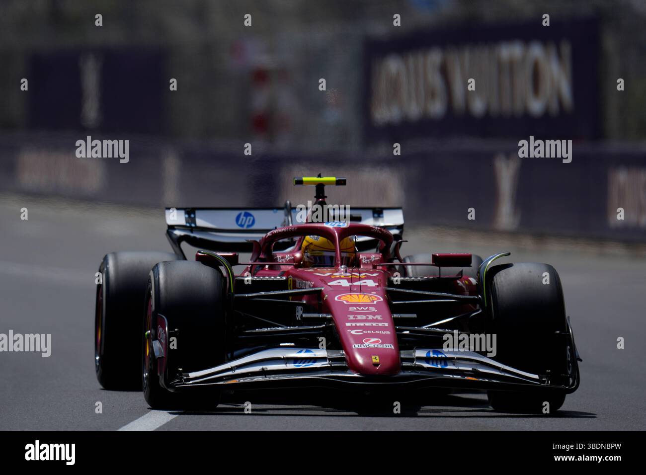 Ferrari driver Lewis Hamilton of Britain steers his car during the ...