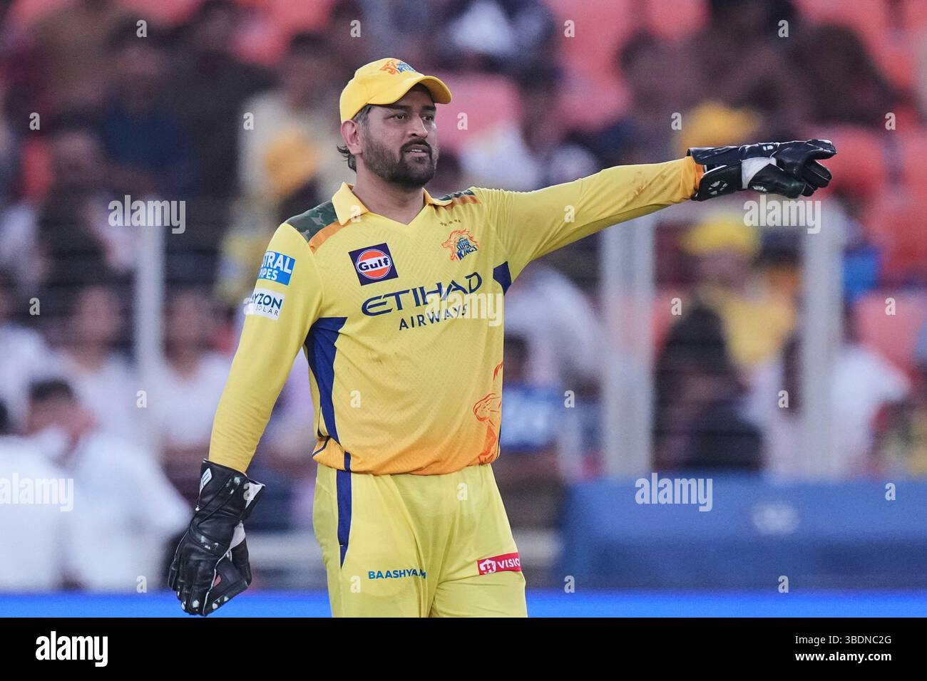 Chennai Super Kings' captain Mahendra Singh Dhoni arranges the field during the Indian Premier ...
