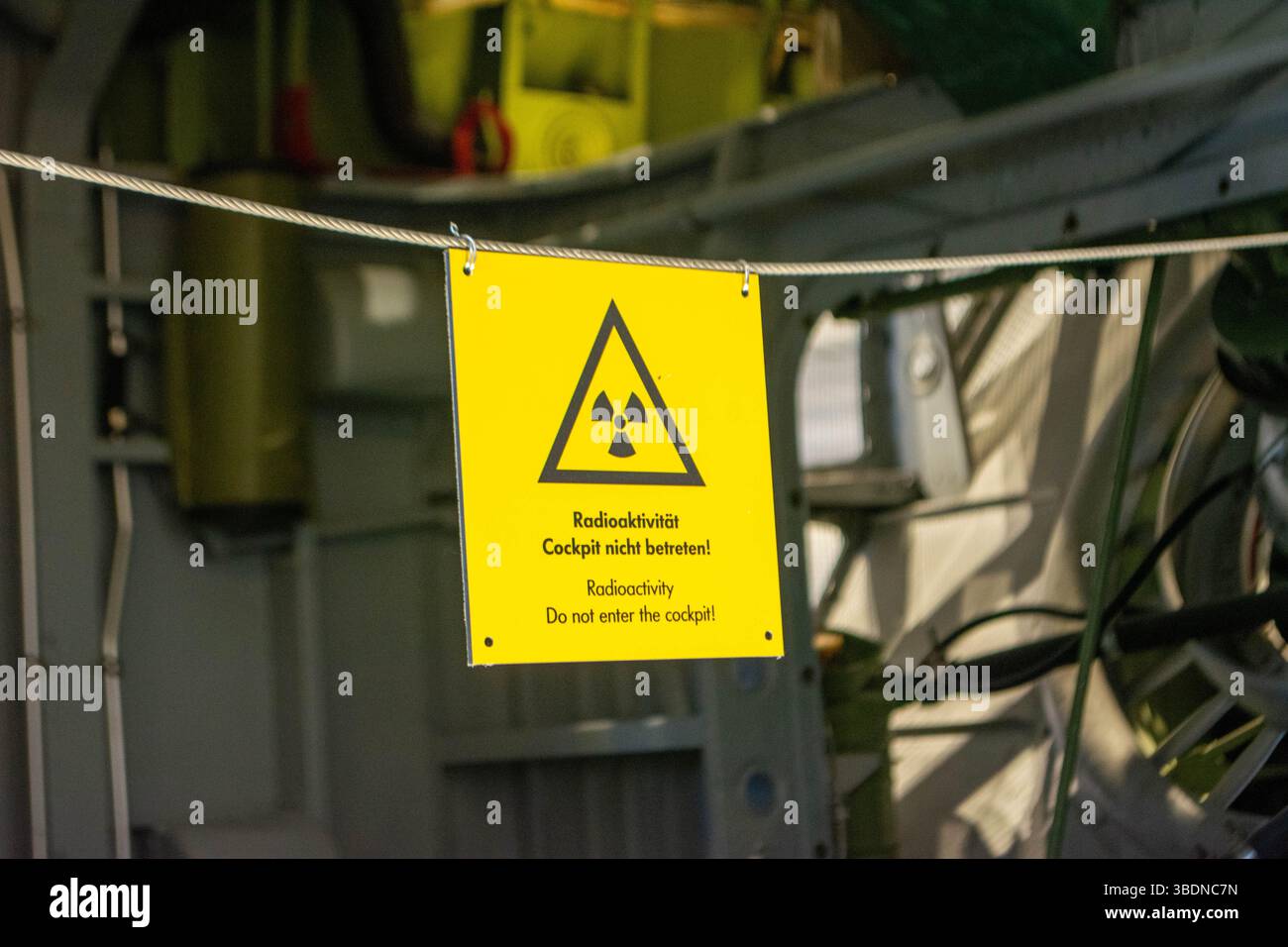 Radioactivity warning in cockpit Stock Photo - Alamy