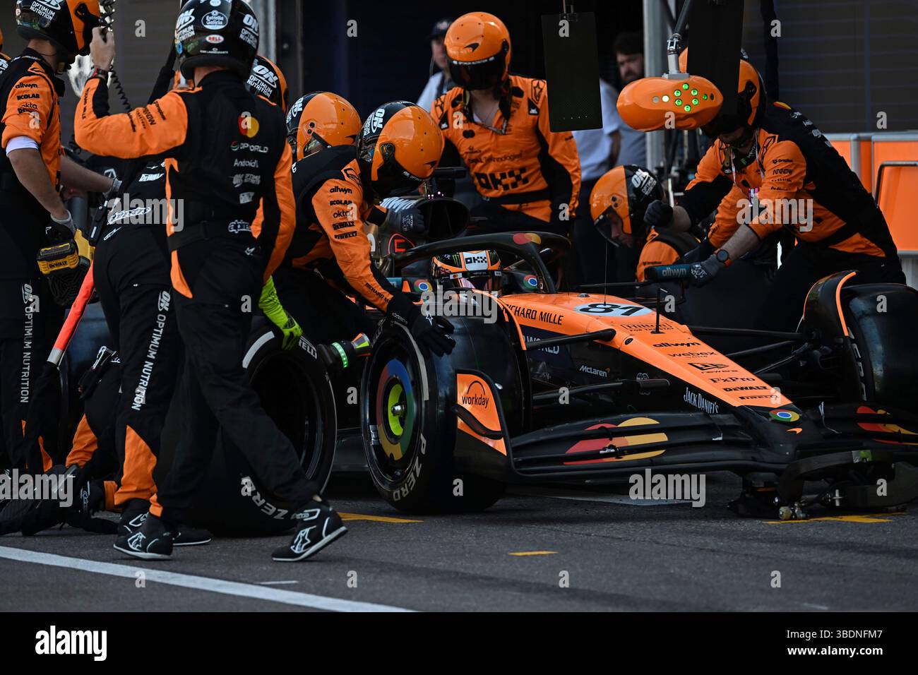 McLaren driver Oscar Piastri of Australia gets a pit service during the ...