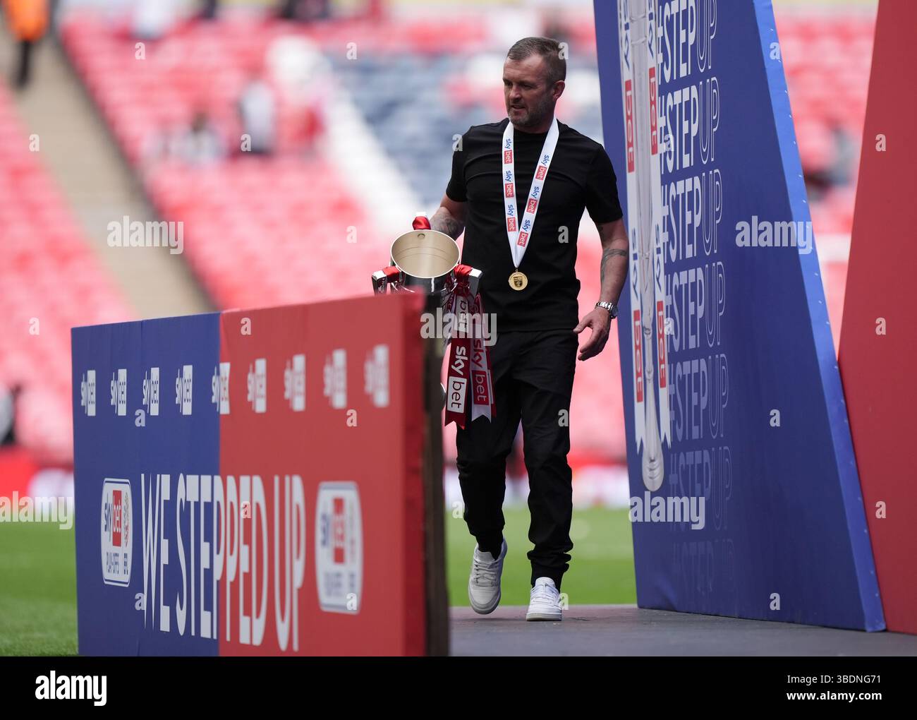 Charlton Athletic manager Nathan Jones with the trophy after the Sky ...