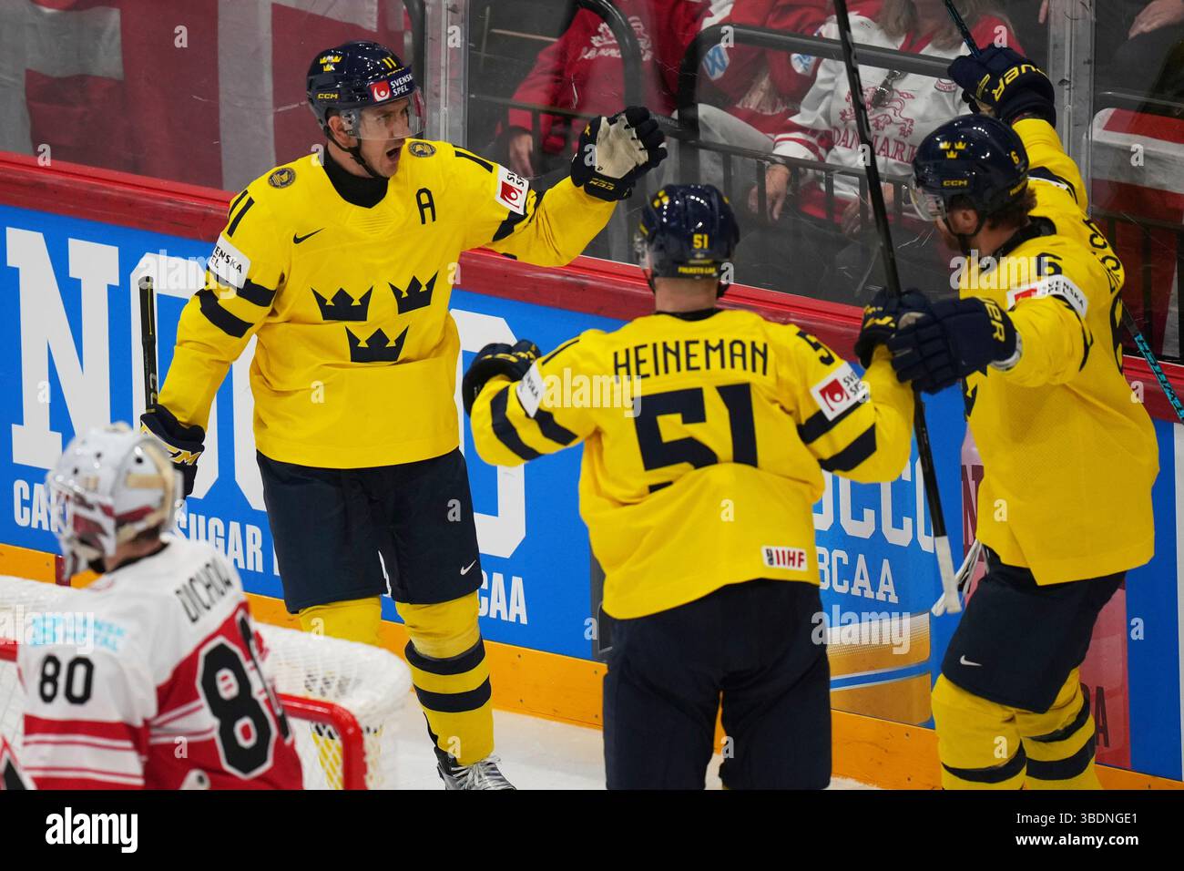 Swedish players celebrate after a goal during the bronze medal match ...