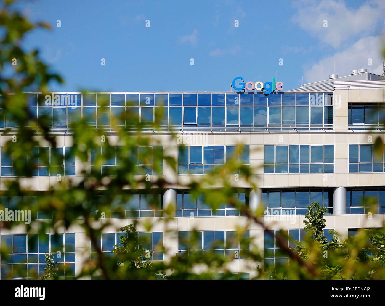 Wroclaw, Poland - May 9, 2025: Google sign on a modern glass office ...