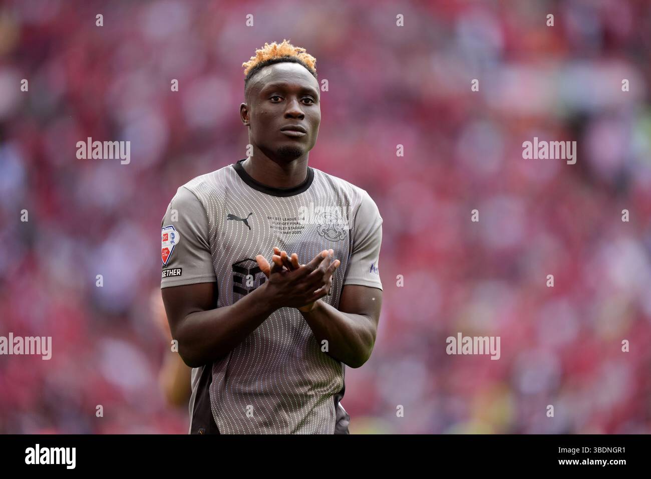 Leyton Orient's Dan Agyei applauds the fans after the Sky Bet League ...