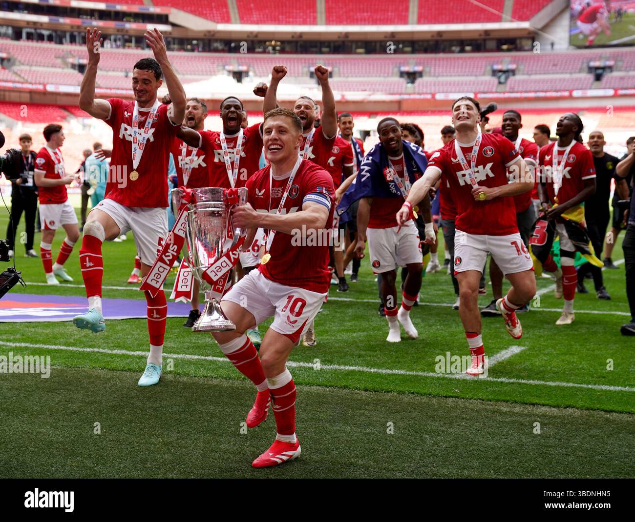Charlton Athletic's Greg Docherty celebrates in front of his fans with ...