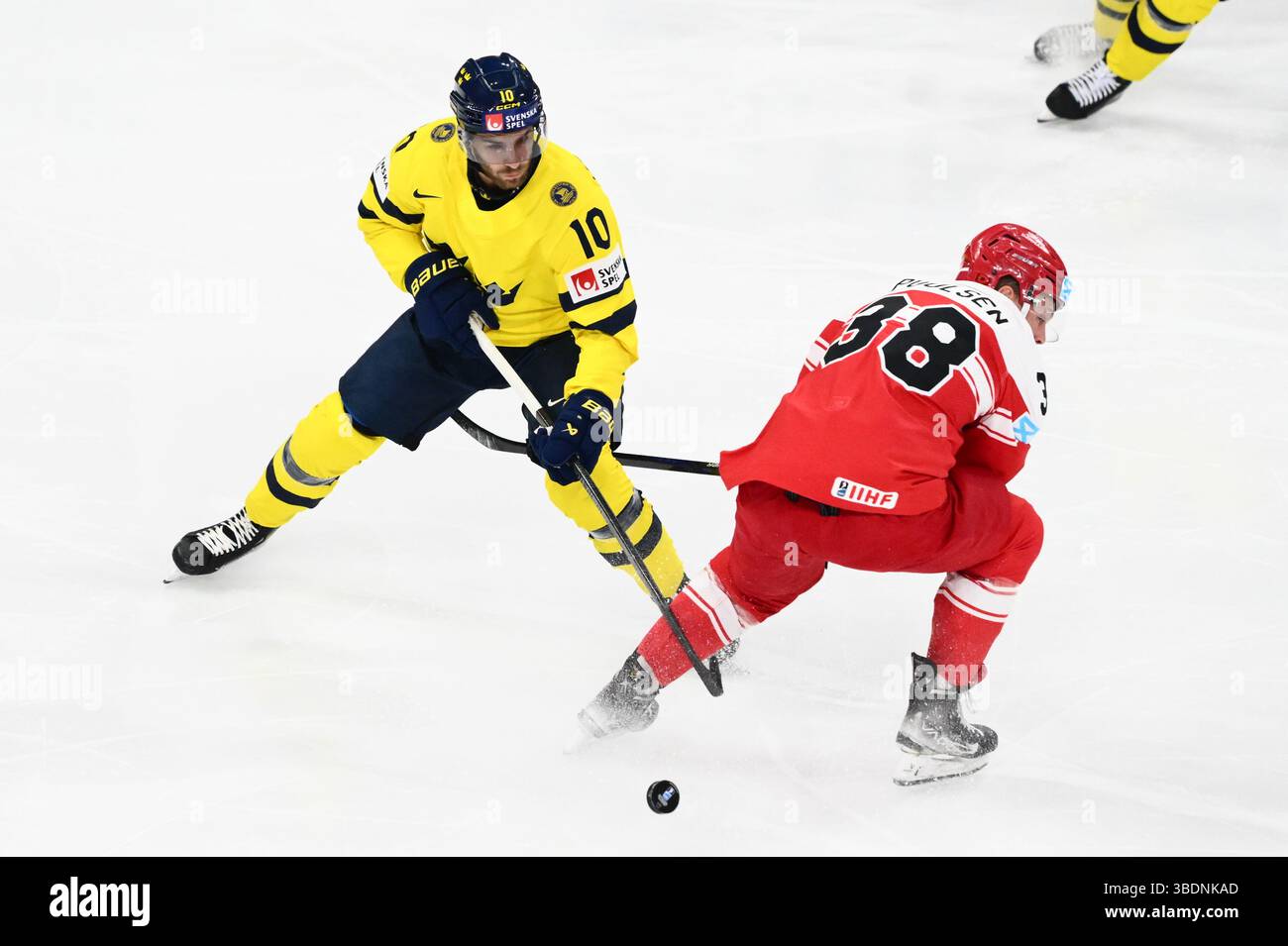 From left Alexander Wennberg of Sweden and Morten Poulsen of Denmark in ...