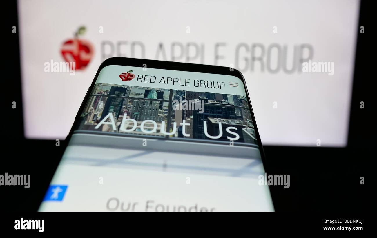 In this photo illustration, a mobile phone with the webpage of US real ...