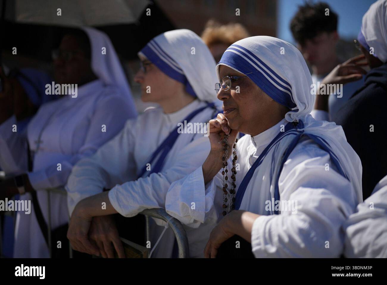 Nuns wait outside Arch Basilica of St. John Lateran where Pope Leo XIV ...