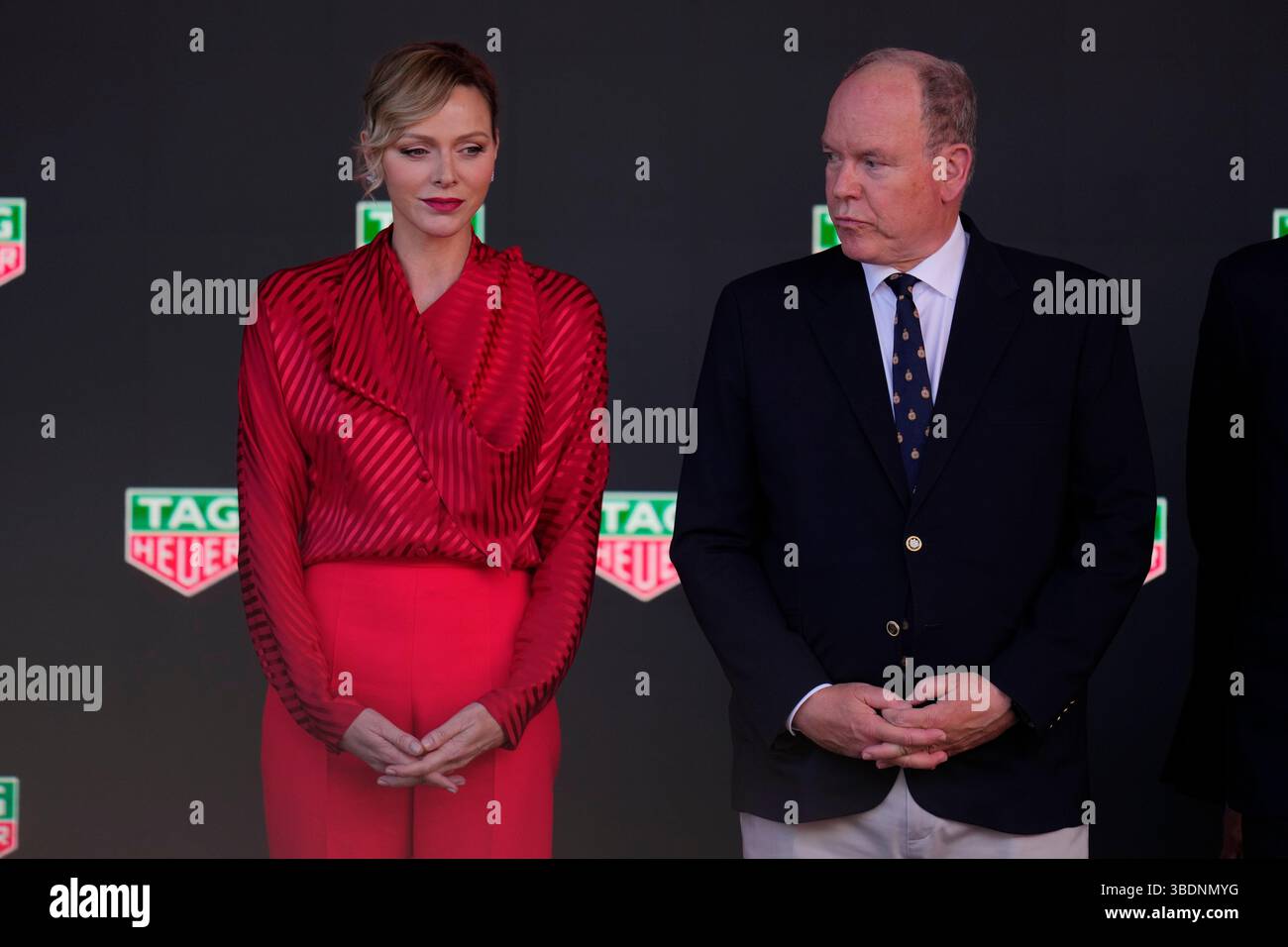 Albert II, Prince of Monaco is on the podium with Charlene, Princess of ...