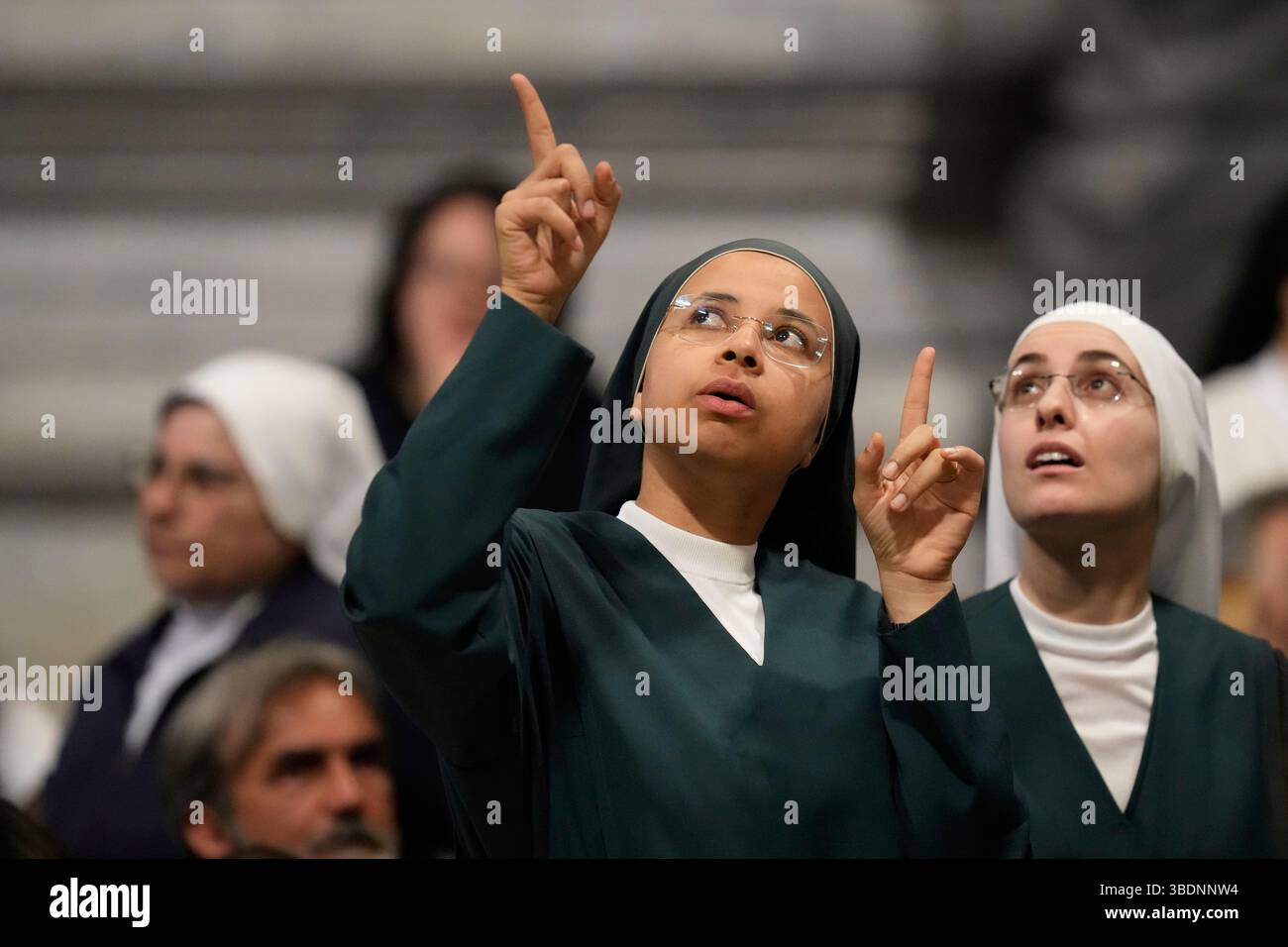 Nuns attend a mass presided by Pope Leo XIV in the Archbasilica of St ...