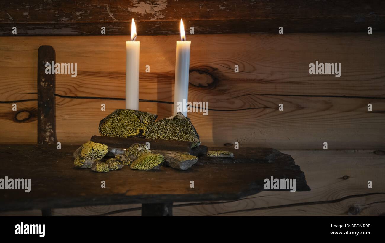 Two burning candles on an altar, chapel, Fokstugu farm, Fjellstue ...