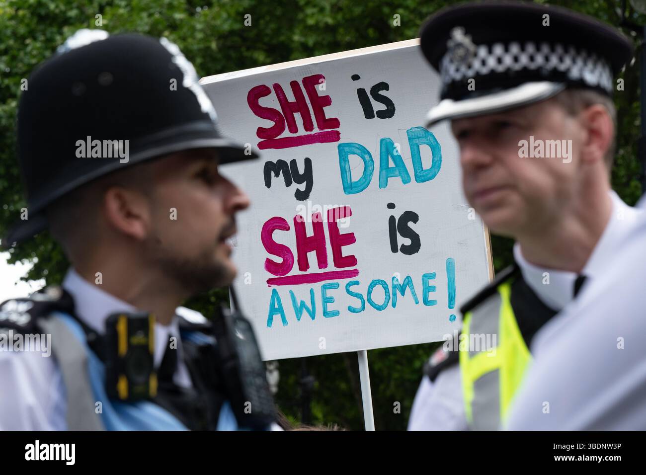 Woman standing placard saying hi-res stock photography and images - Alamy