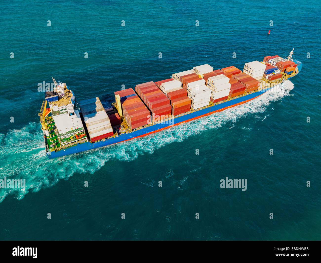 Aerial view cargo ship facing sea. Cargo business. Container ship ...