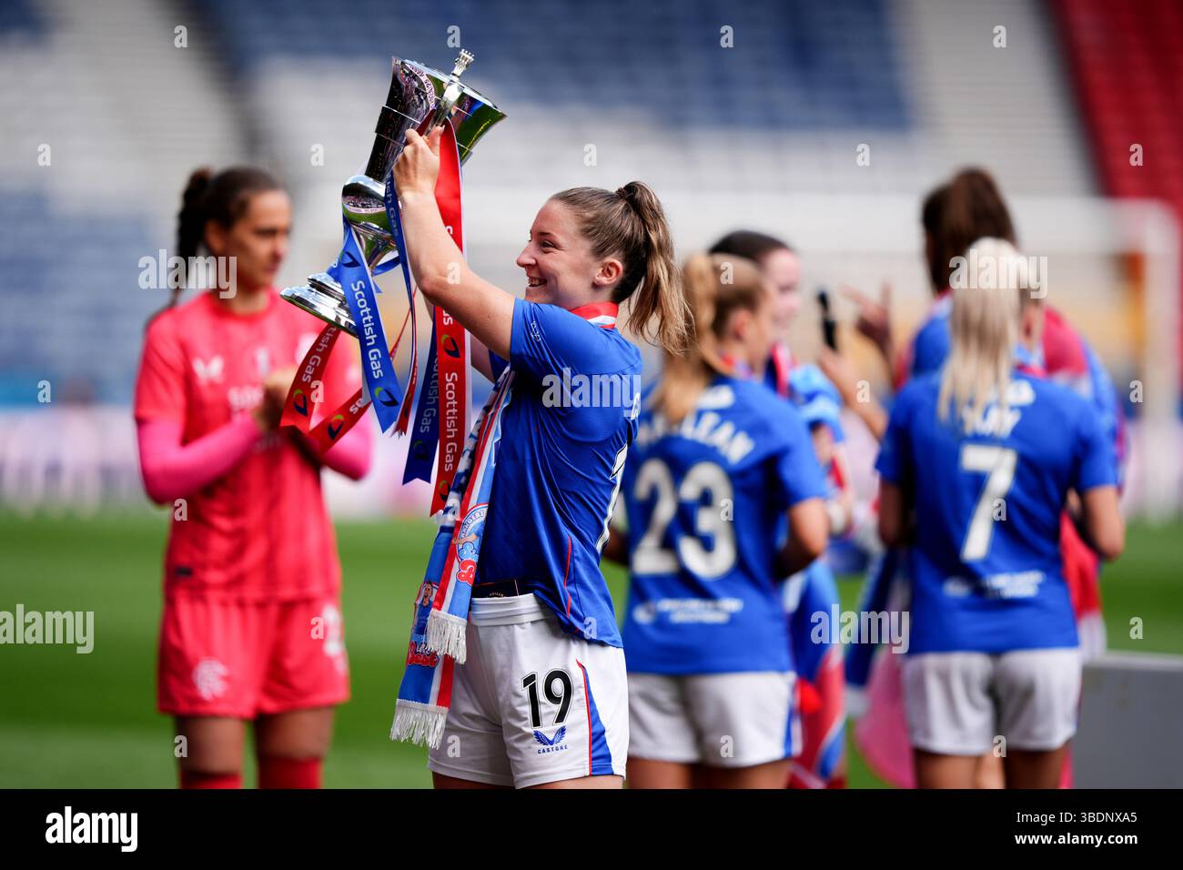 Rangers' Chelsea Cornet celebrates with the trophy following the ...