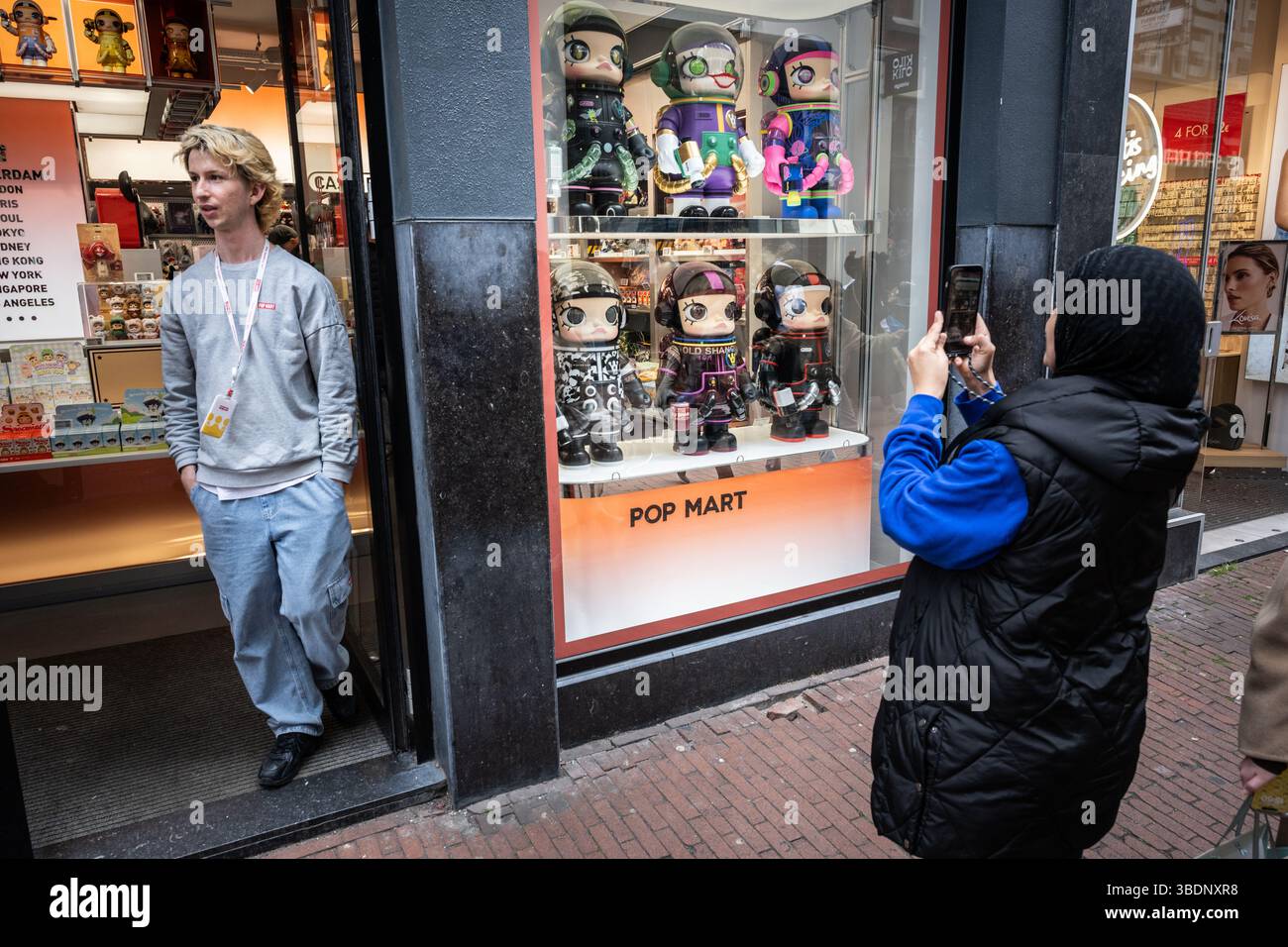 AMSTERDAM - window of the Pop Mart store on Kalverstraat. The store ...