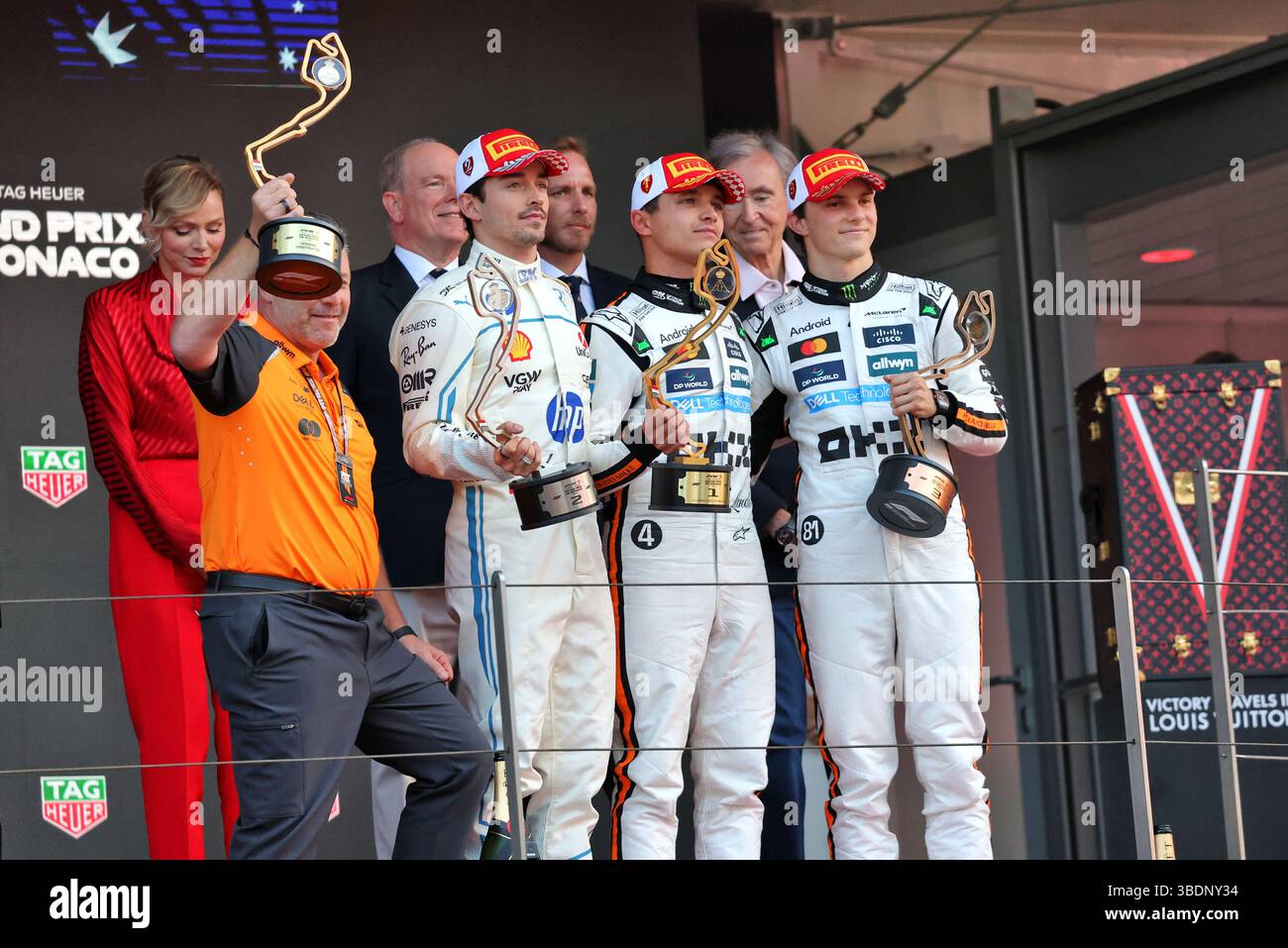 Monaco, Monte Carlo. 25th May, 2025. The podium (L to R): Zak Brown (USA) McLaren Executive ...
