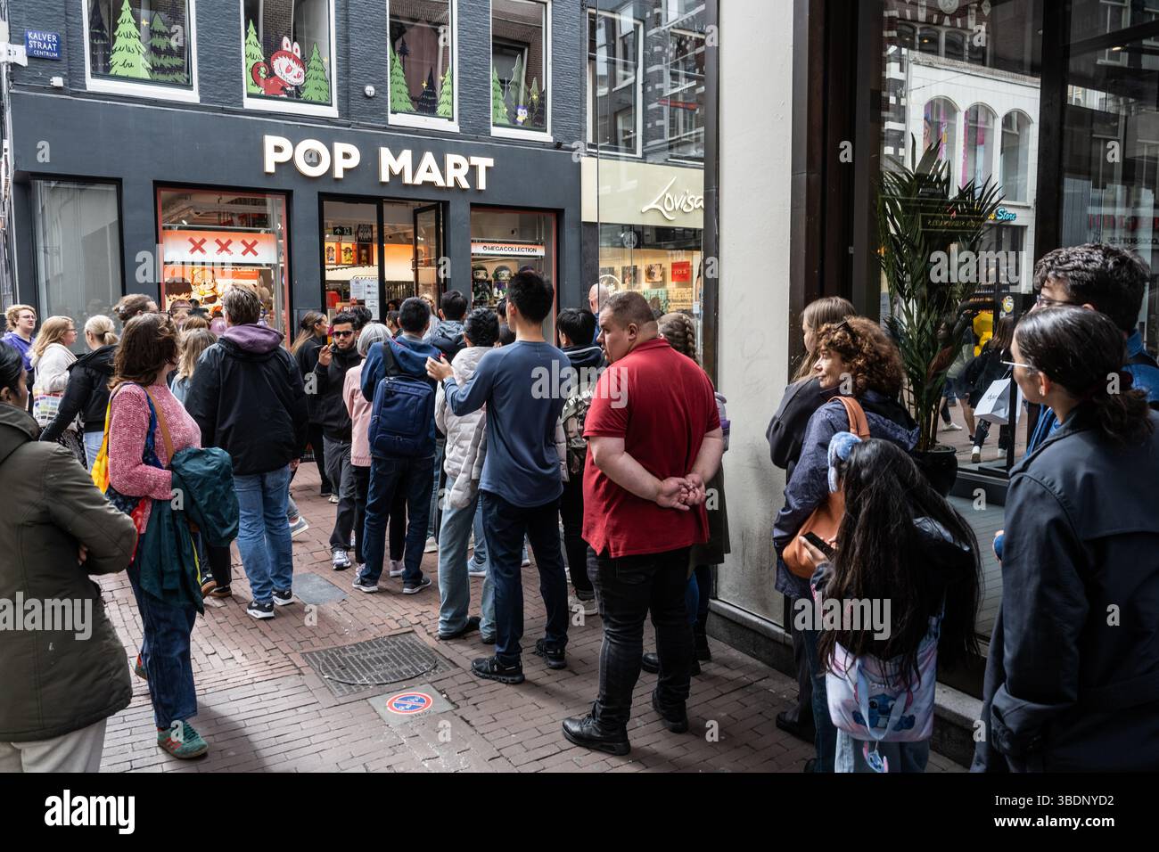AMSTERDAM - Queues at the Pop Mart store on Kalverstraat. People line ...