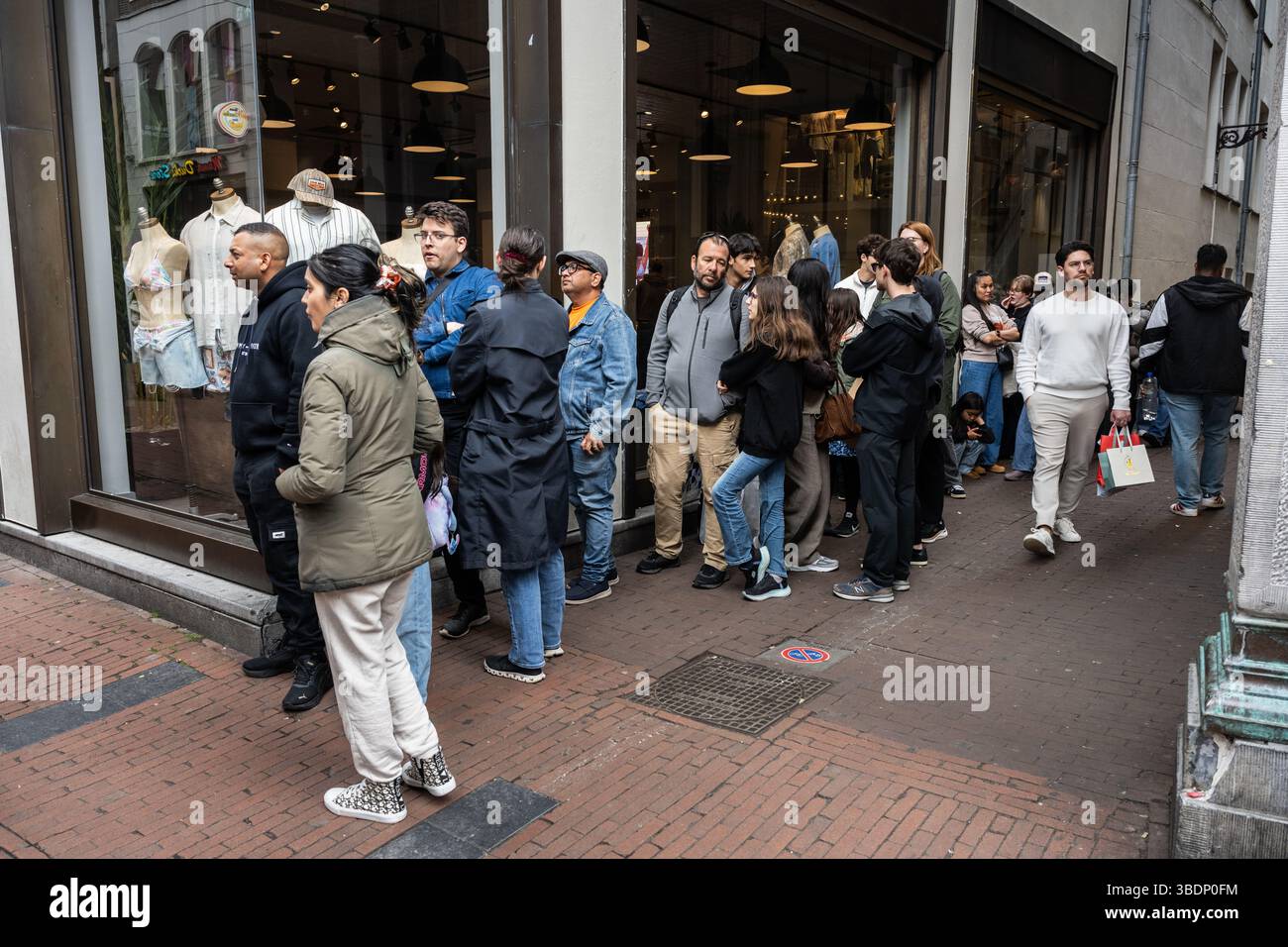 AMSTERDAM - Queues at the Pop Mart store on Kalverstraat. People line ...
