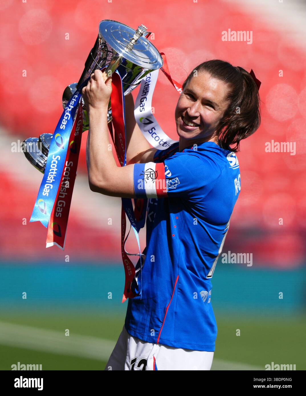 Rangers' Jane Ross with the trophy, celebrates with team mates ...