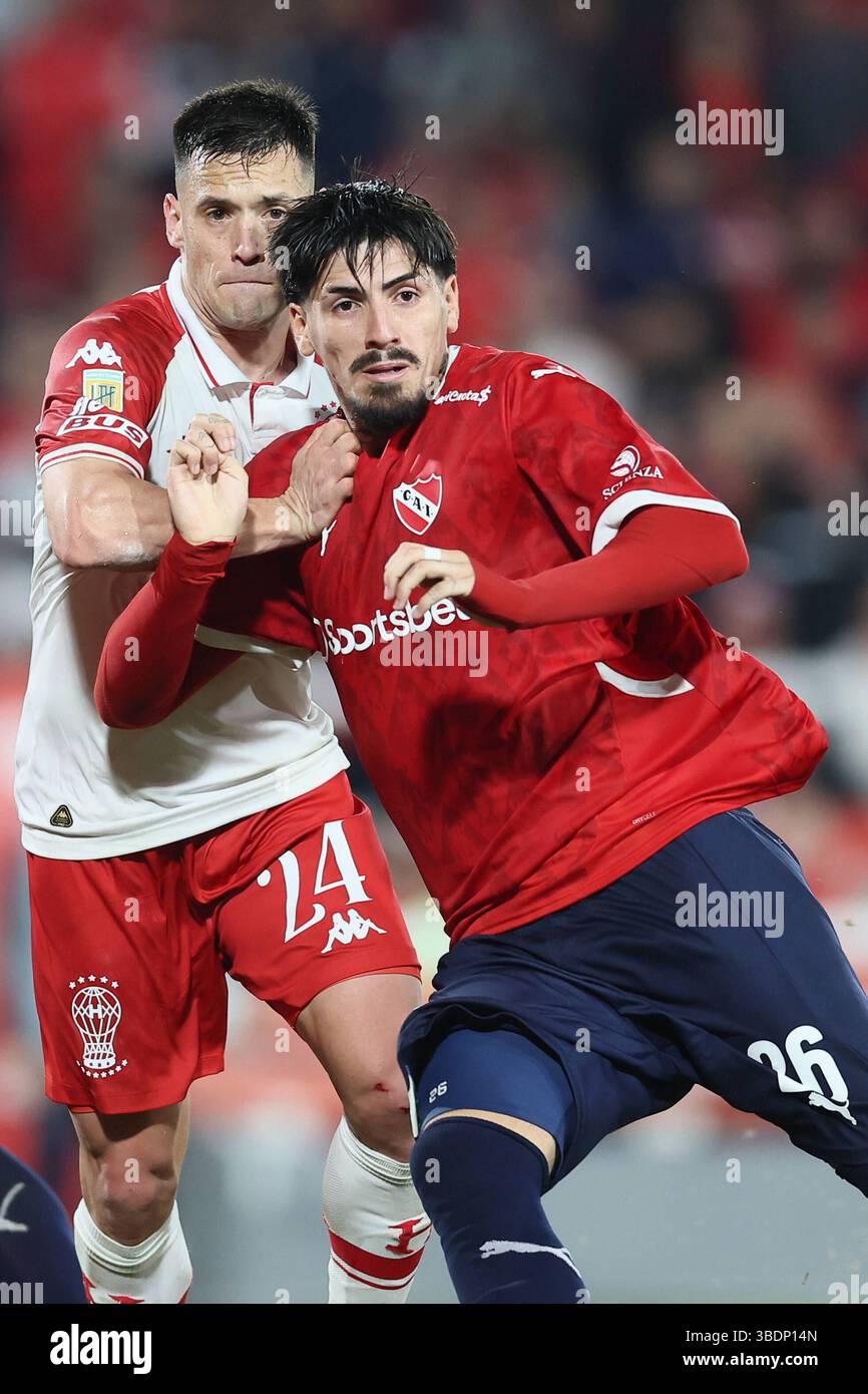 Independiente s defender Kevin Lomonaco R and Huracan s defender Tomas ...